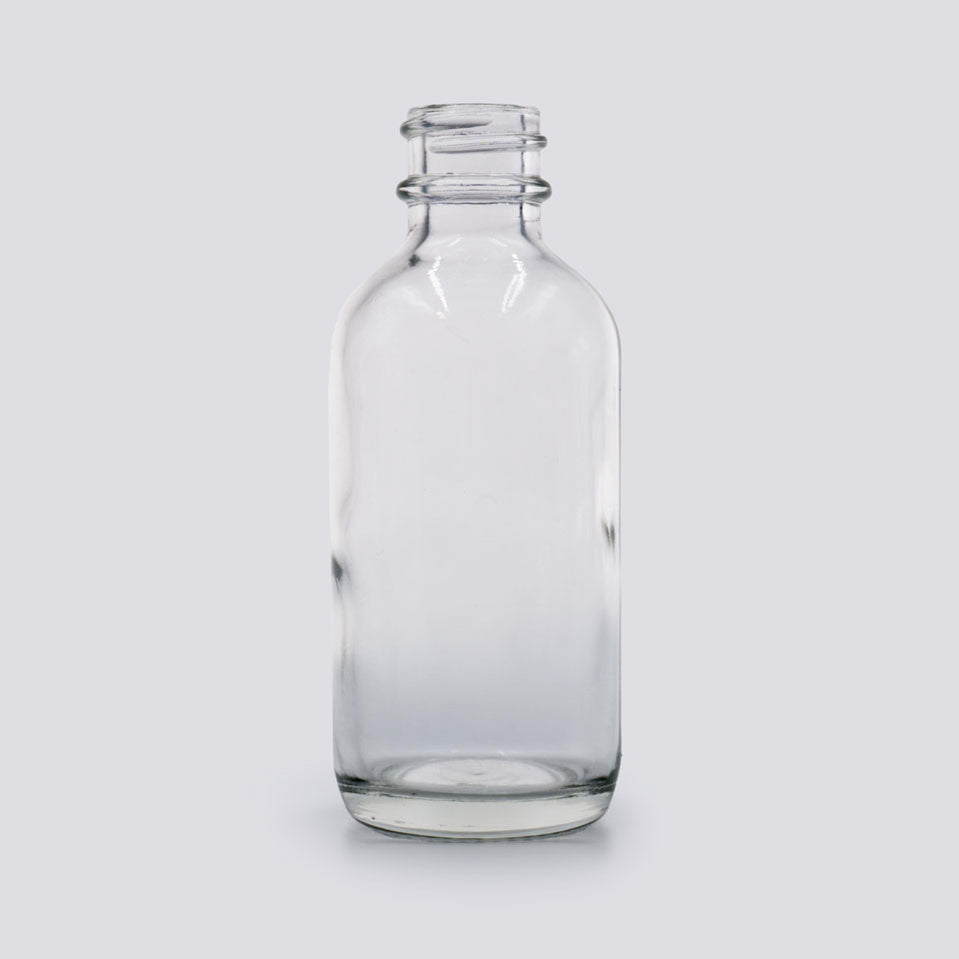 2 oz. Clear Glass Boston Round Bottle — K.G. International